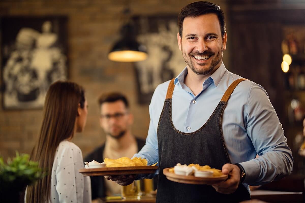 Waitress Serving Mexican Food